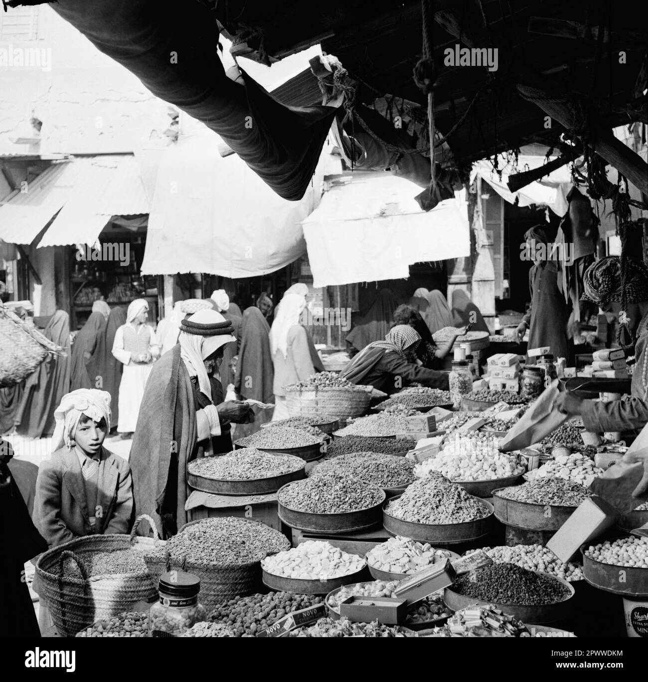People shopping at an open air market in Riyadh, Saudi Arabia, 1952 ...
