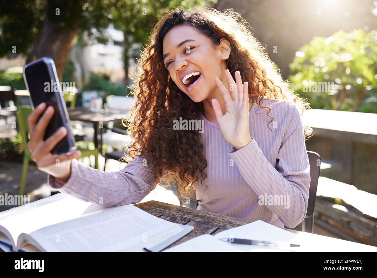 Making the most of my study breaks. a young female student using a ...