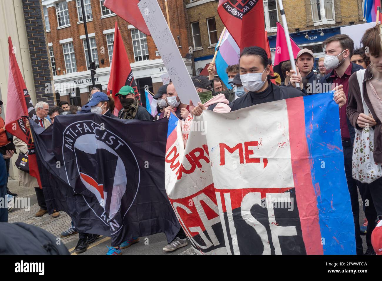 London, UK. 1 May 2023. IWW march with a banner with Joe Hill's message ...
