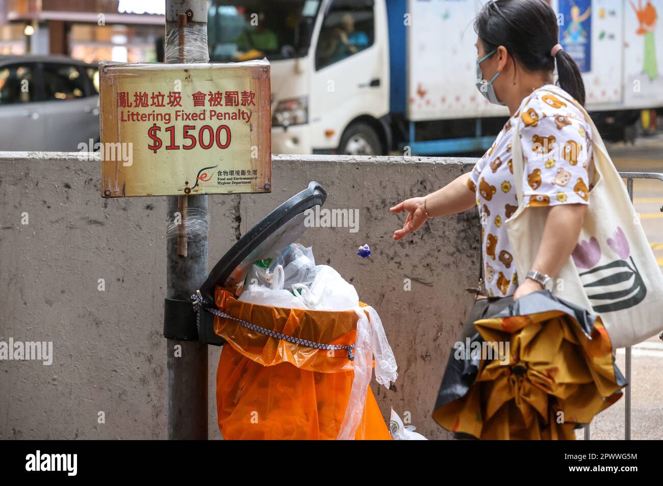 Rubbish strewn along a street in Mong Kok. Hong Kong weighs doubling of ...