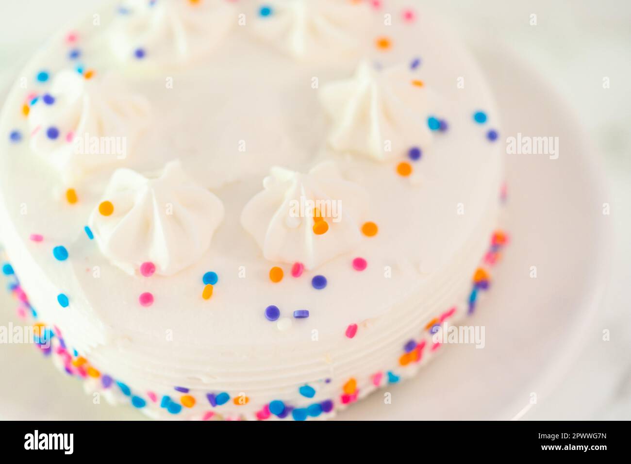 Birthday cake with funfetti sprinkles Stock Photo - Alamy