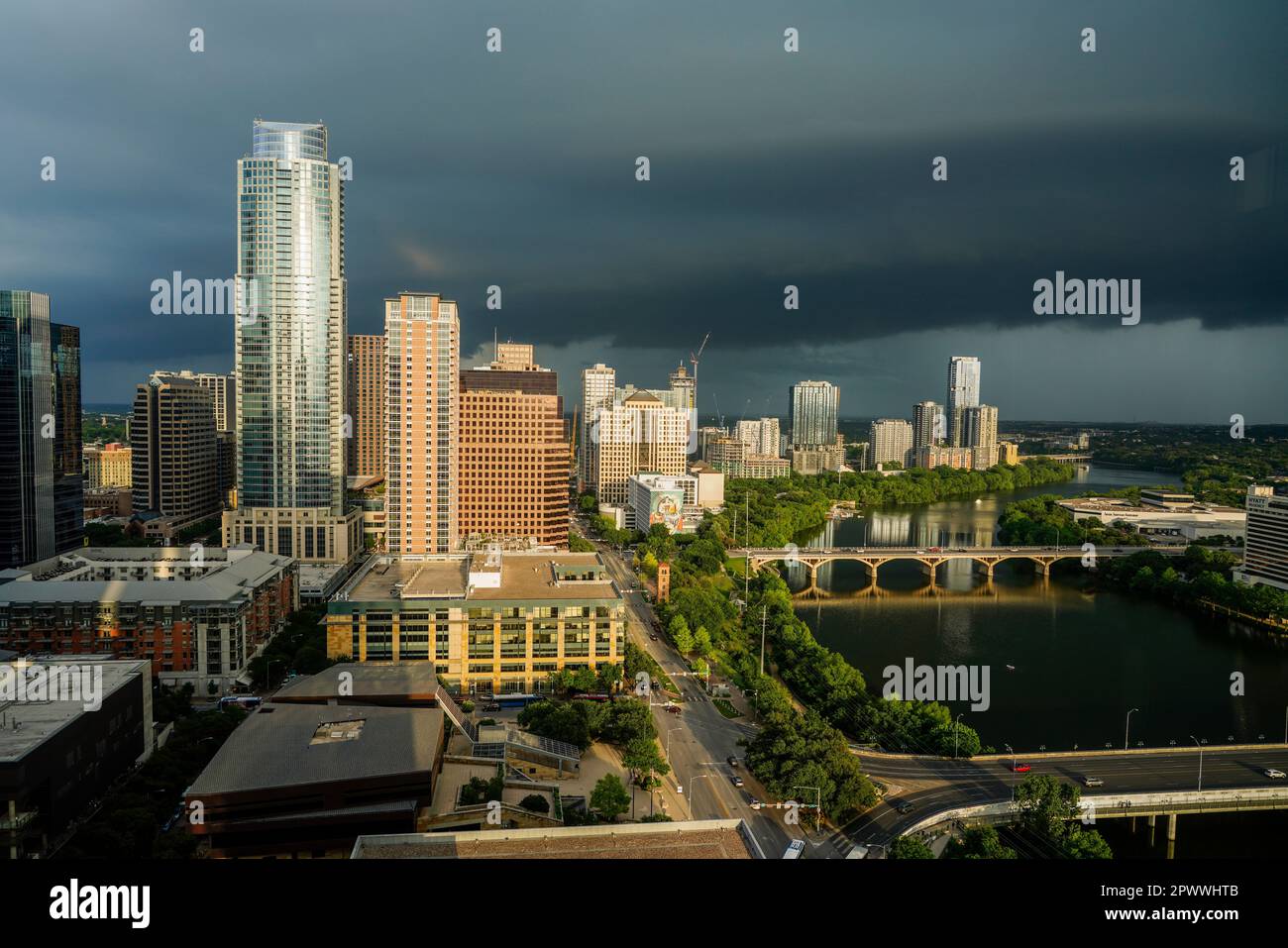 Storm clouds over downtown Austin Texas with Ladybird Lake and Congress ...