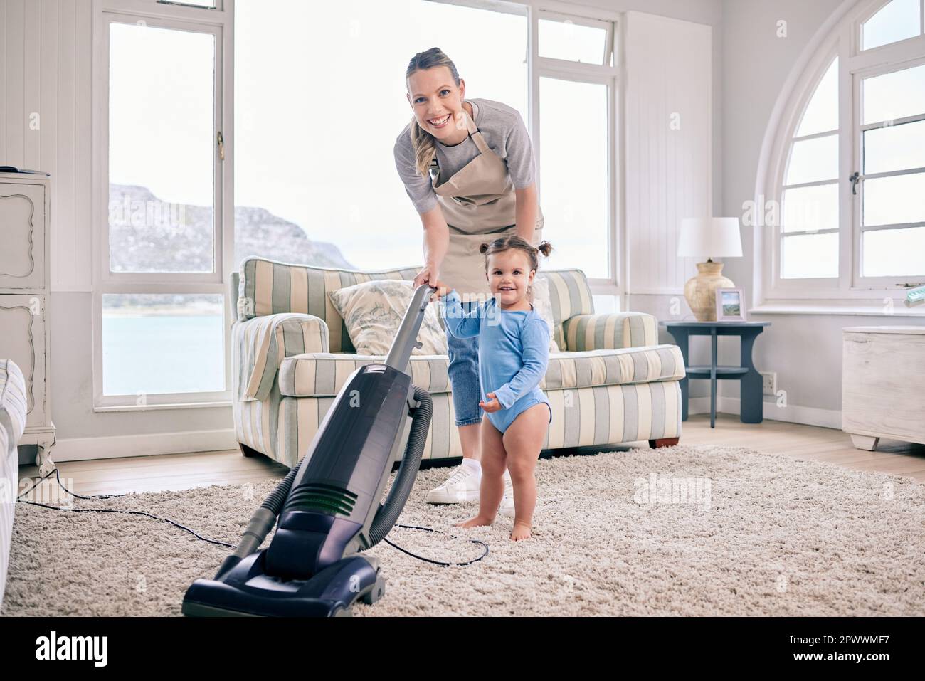 A Day In The Life Of A Stay At Home Mom A Mom Vacuuming The Living
