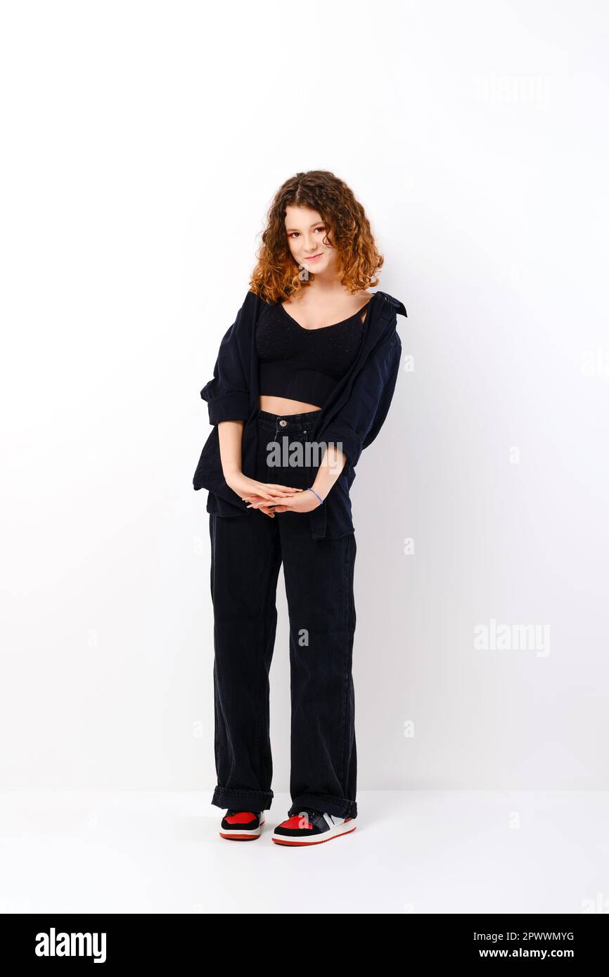 Cute teenager girl girl pretends to be embarrassed Stock Photo - Alamy