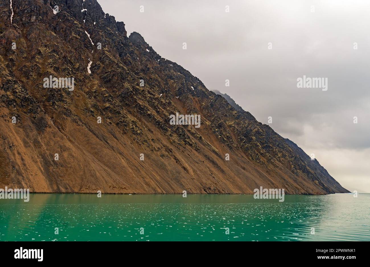 Barren Slopes Running Into an Aqua Sea at Lilliehookfjorden in teh ...