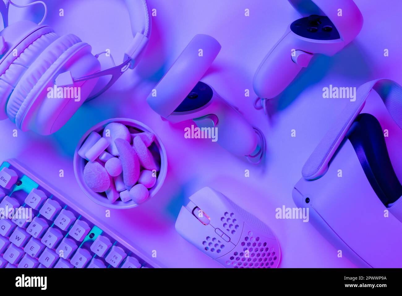 Keyboard with marshmallows and accessories on desk Stock Photo - Alamy