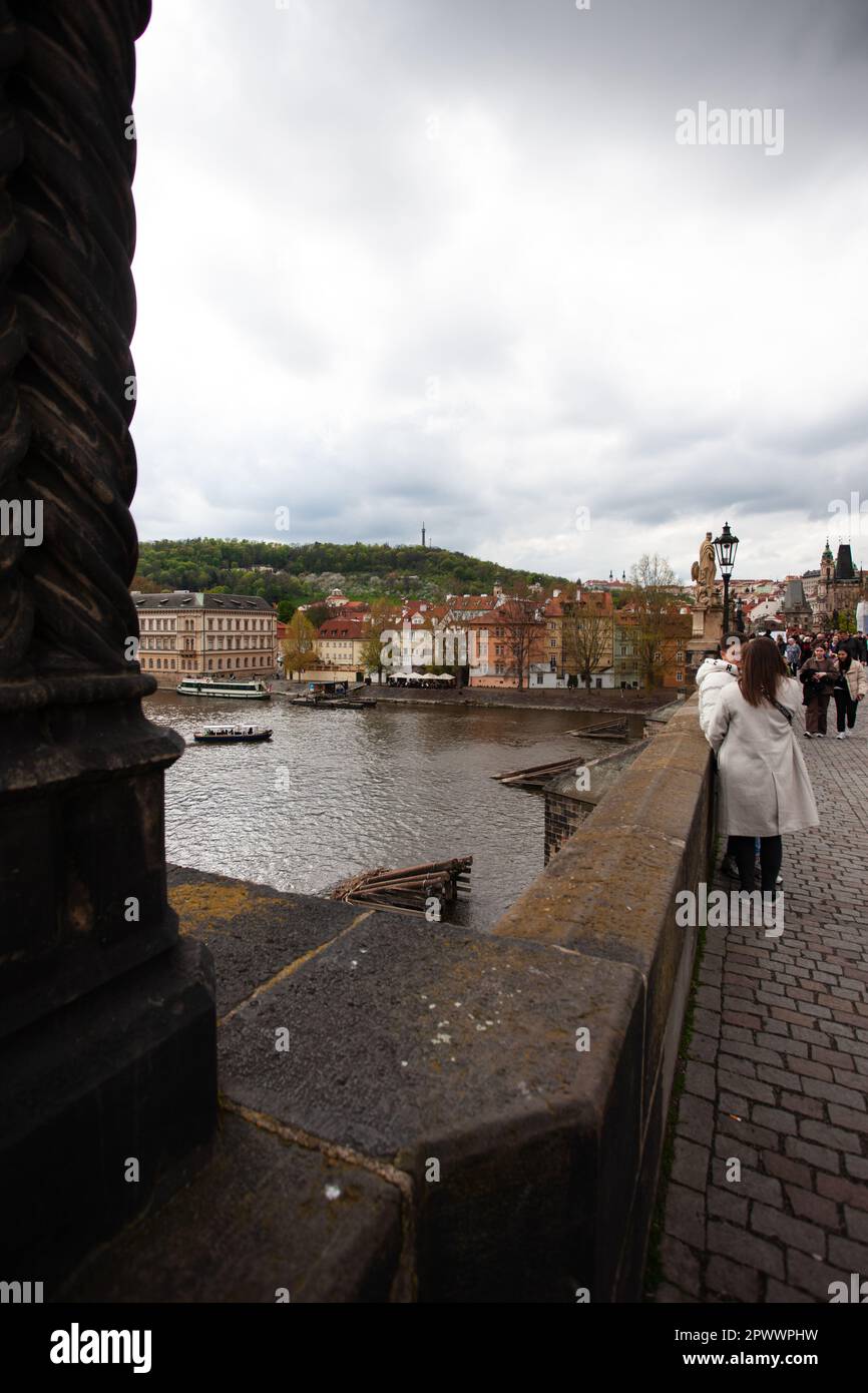 The river and the stone bridge and the statues Stock Photo - Alamy