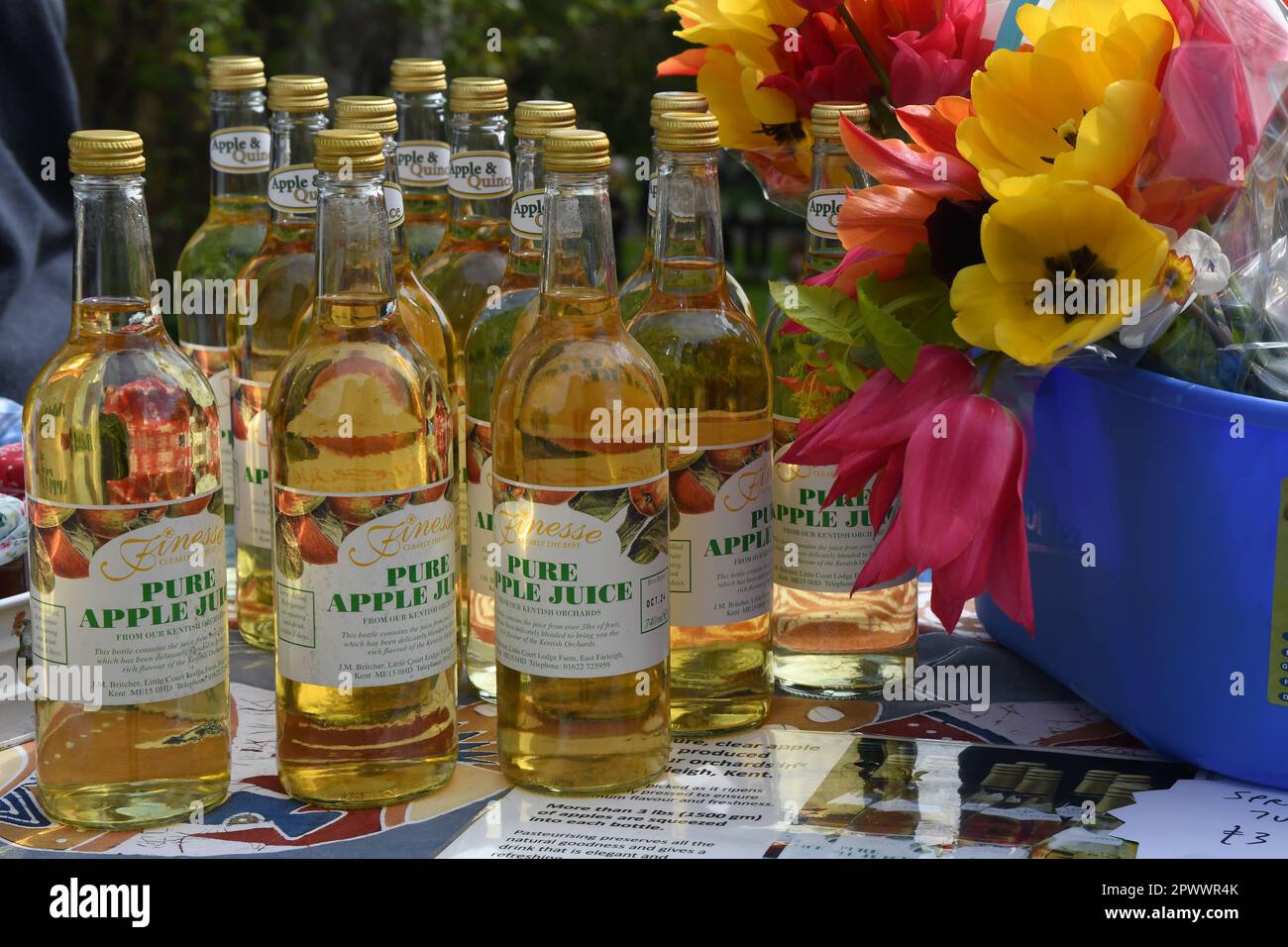 Pure apple juice at a garden fete Stock Photo - Alamy