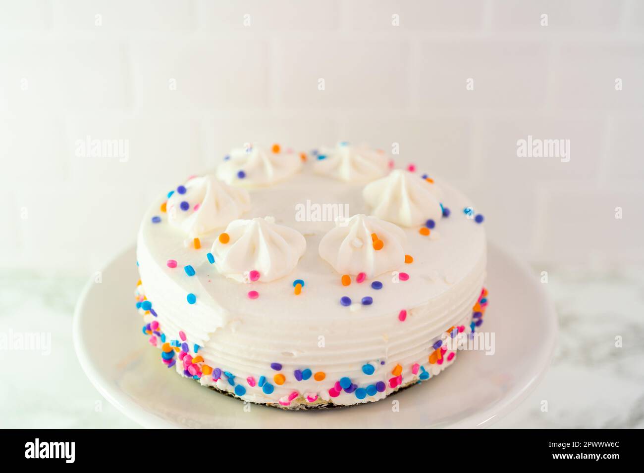 Birthday cake with funfetti sprinkles Stock Photo - Alamy