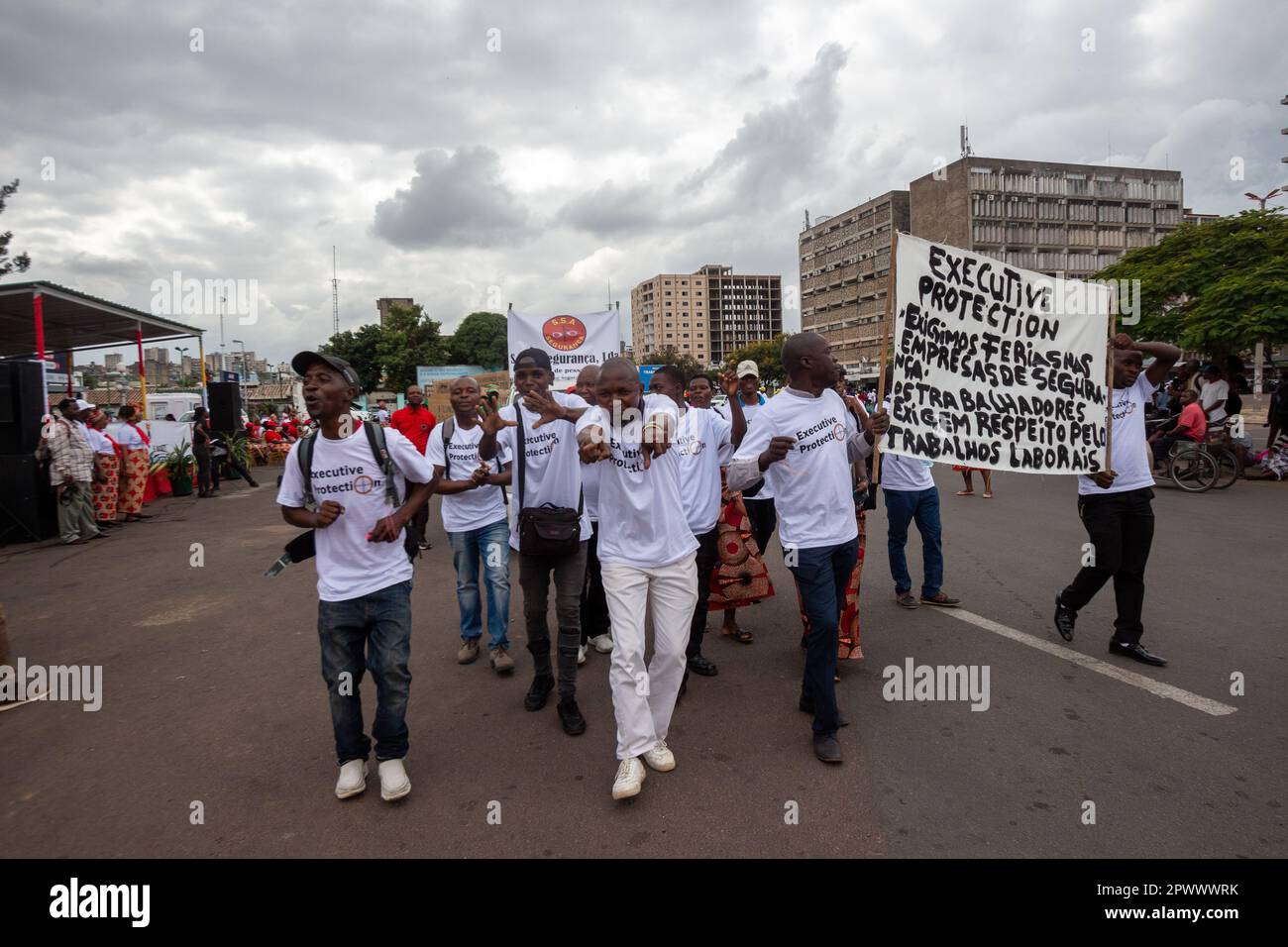 Workers with banners marching on International Workers' Day at the ...