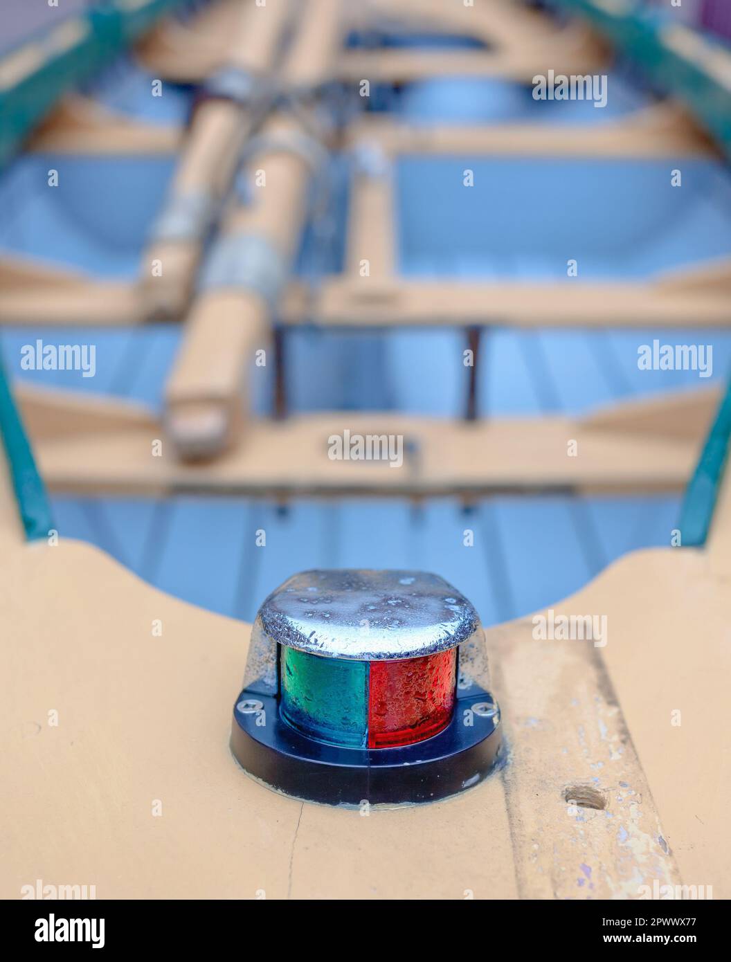 Close up view of a rustic rowboat bow and navigation light Stock Photo ...