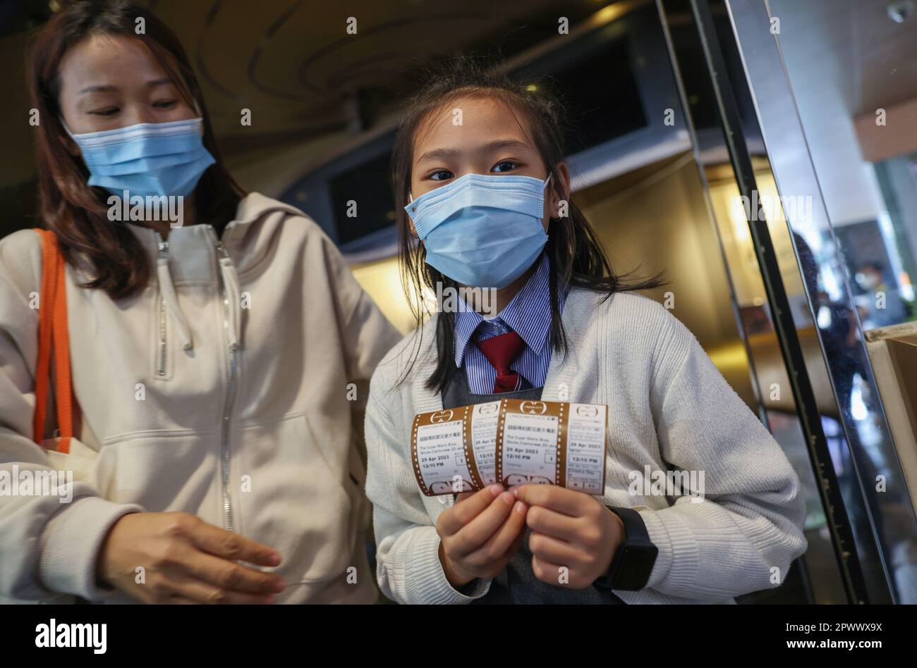 A girl showing the HH30 movie ticketsHHon Cinema Day 2023 on April 29 ...