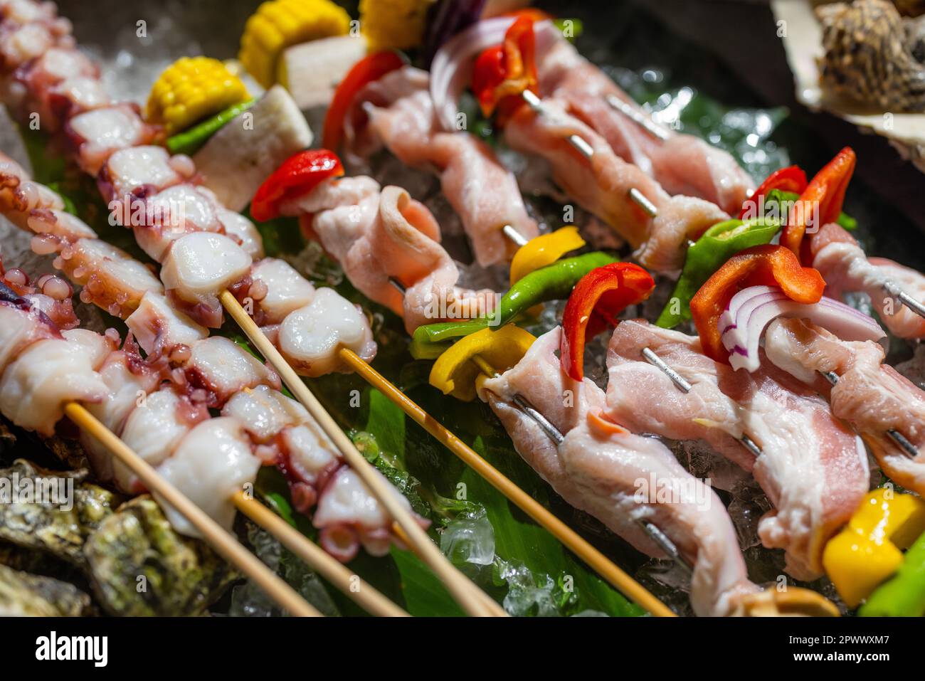 Squid and vegetable on the skewers Stock Photo - Alamy