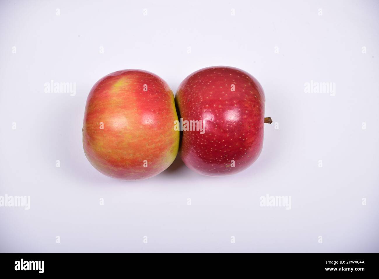 red apple side view on an isolated background Stock Photo - Alamy