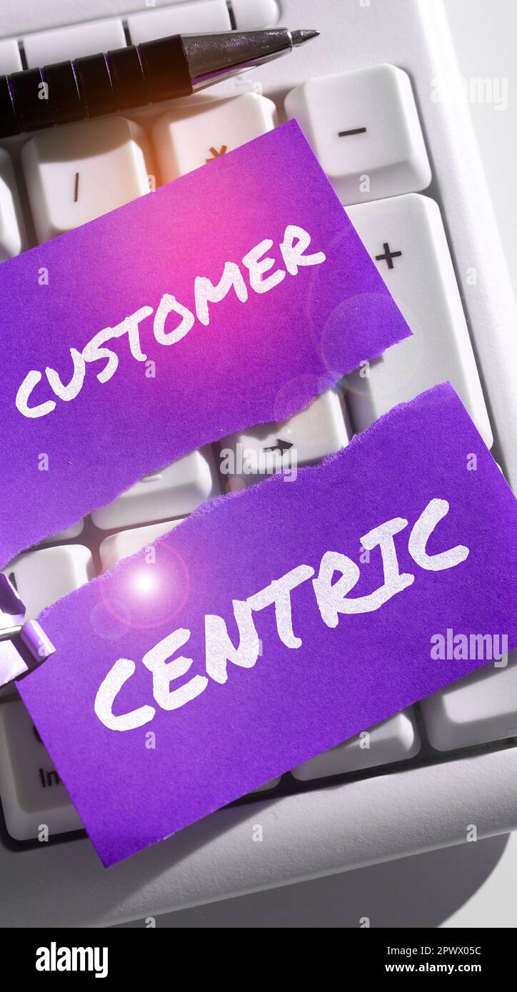 Hand writing sign Customer Centric, Business concept process of looking ...