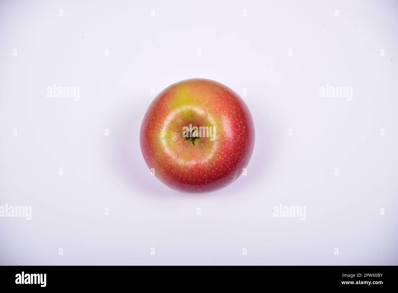 red apple top view angle on an isolated background Stock Photo - Alamy