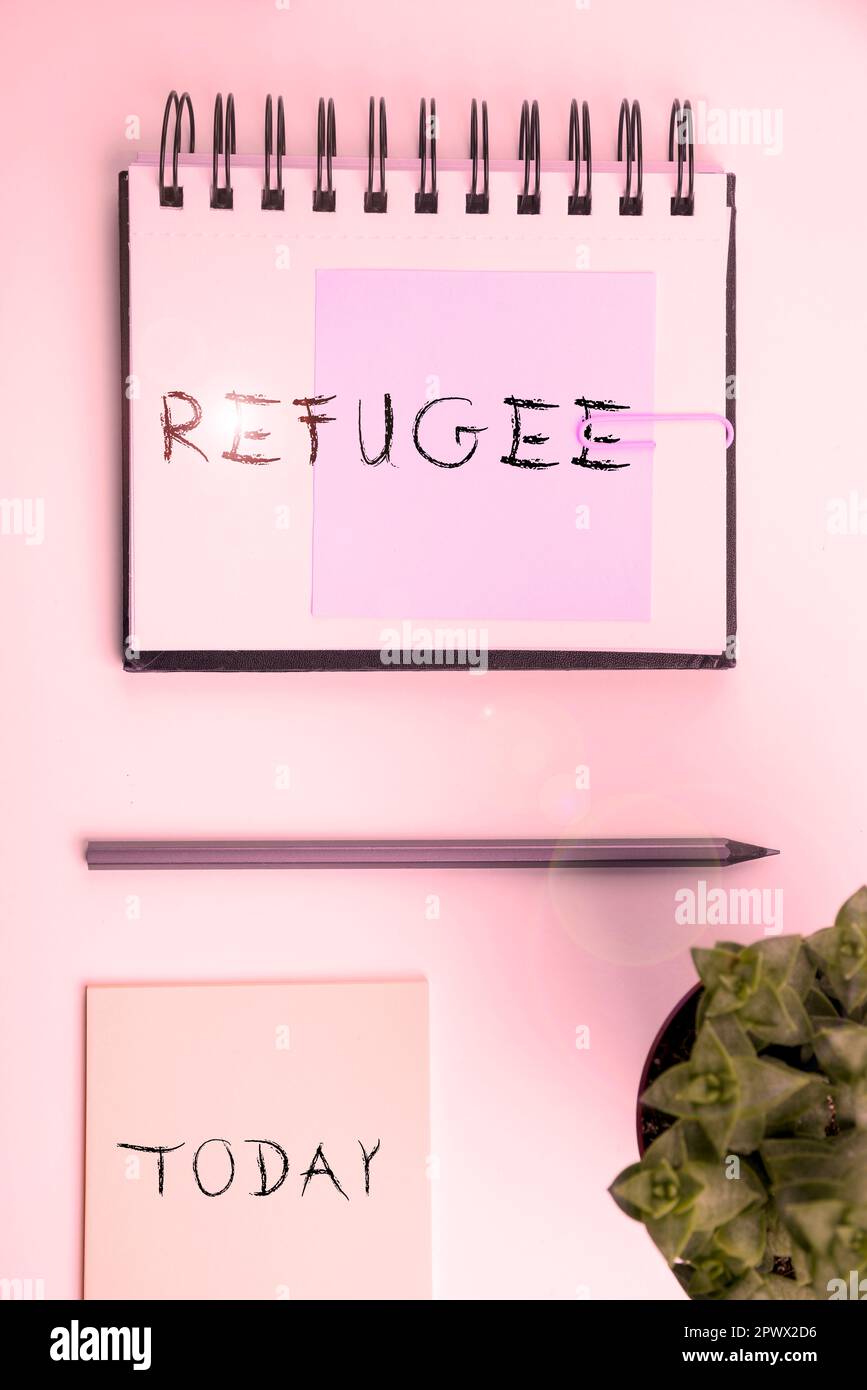 Text sign showing Refugee, Business concept refer to movements of large ...
