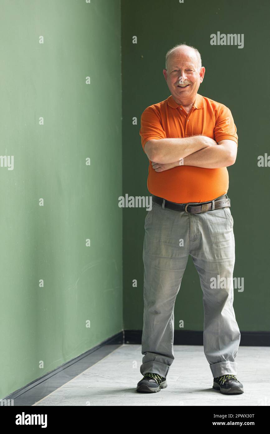 Full Length Portrait Of Grey Haired Senior Man With Mustache Wearing