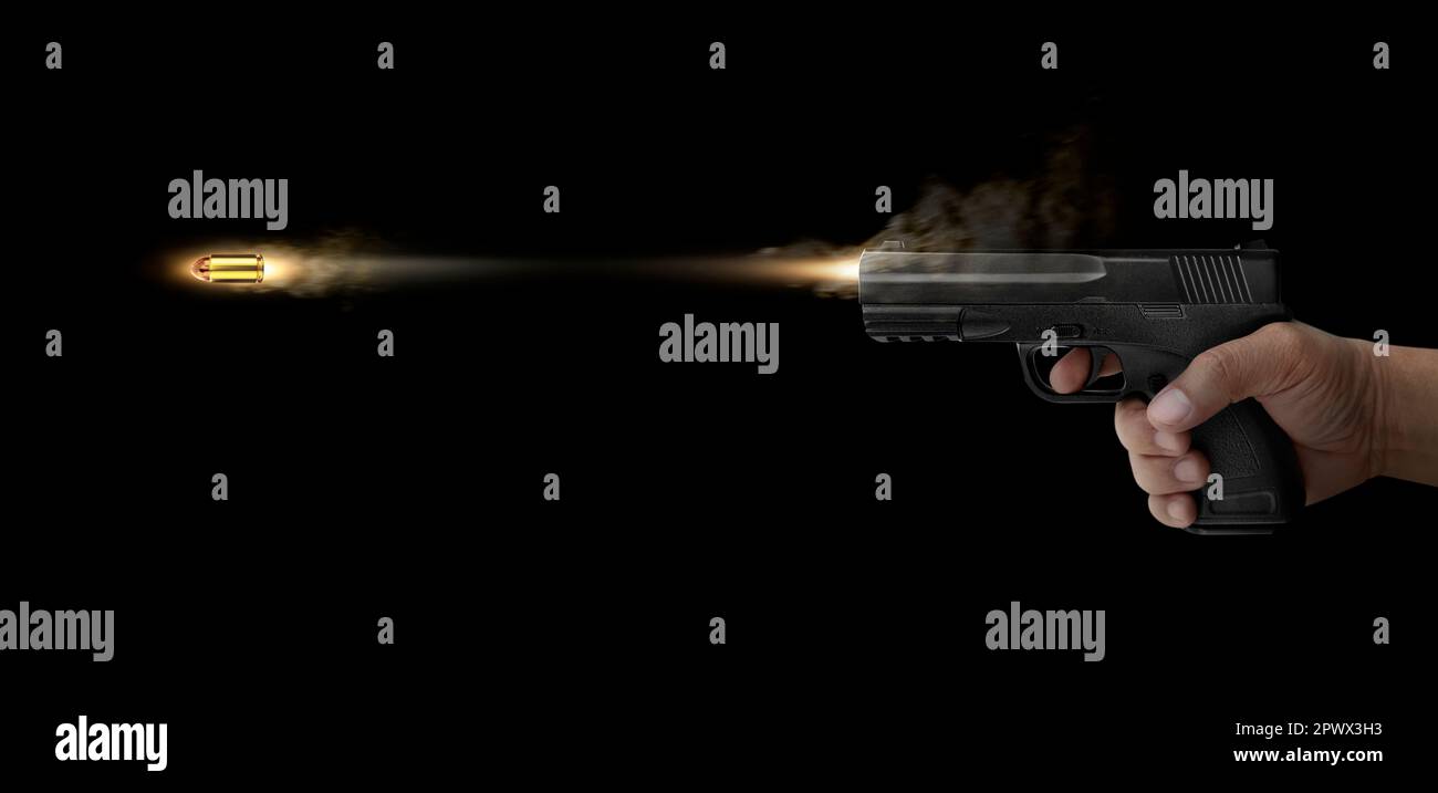 concept of freezing shot of a gun on a dark backgroundFreezing shot of ...
