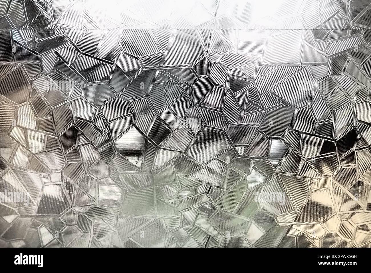 Fluted glass with backlight. Beautiful multicolored refraction of light ...