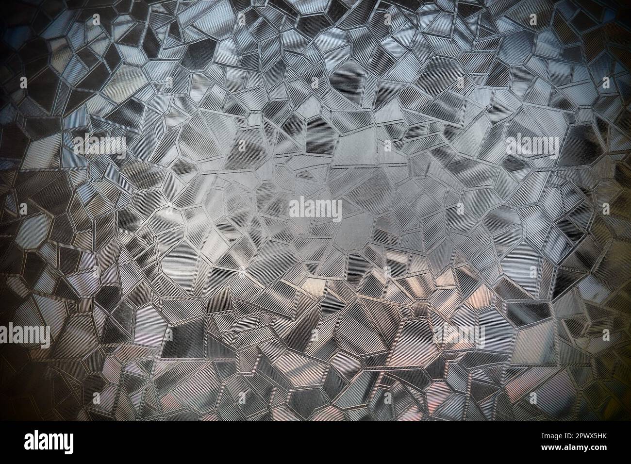 Fluted glass with backlight. Beautiful multicolored refraction of light ...