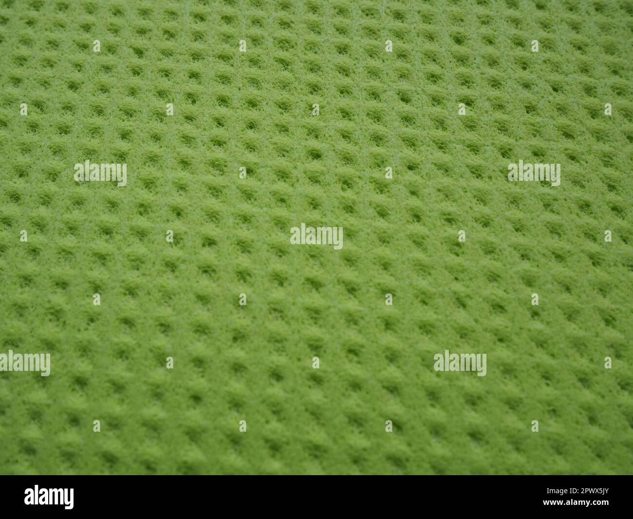 Sponge fibers sponge texture pattern surface close-up green yellow ...