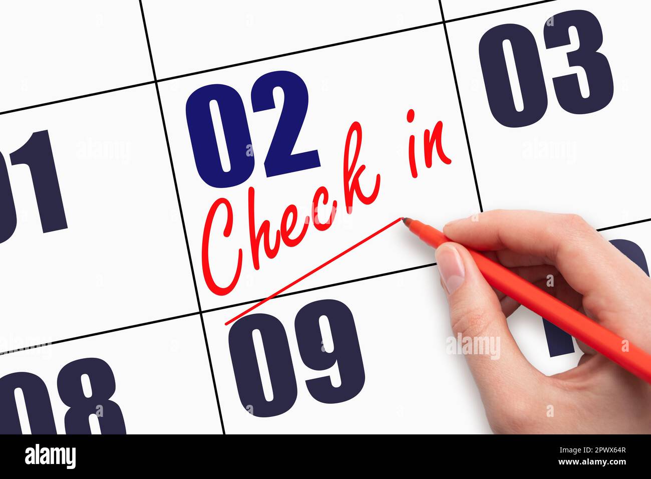 2nd day of the month. Hand writing CHECK IN and drawing a line on ...