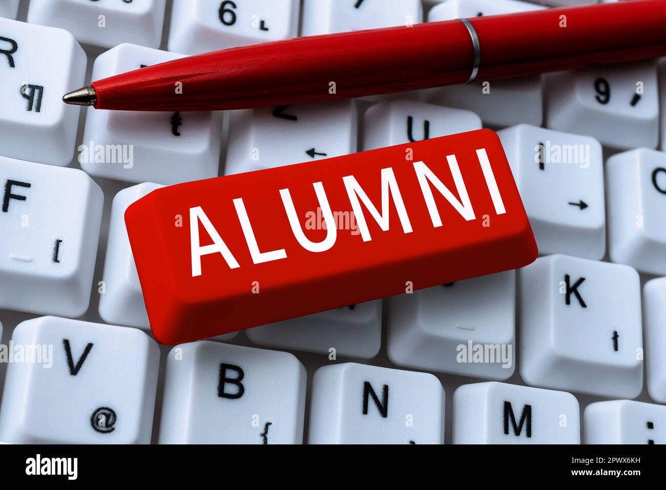 Hand writing sign Alumni, Internet Concept former pupil or student ...