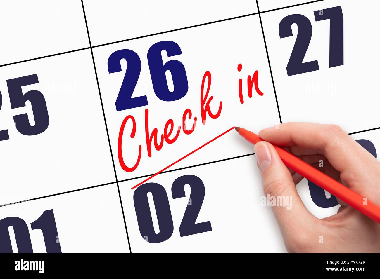 26th day of the month. Hand writing CHECK IN and drawing a line on ...