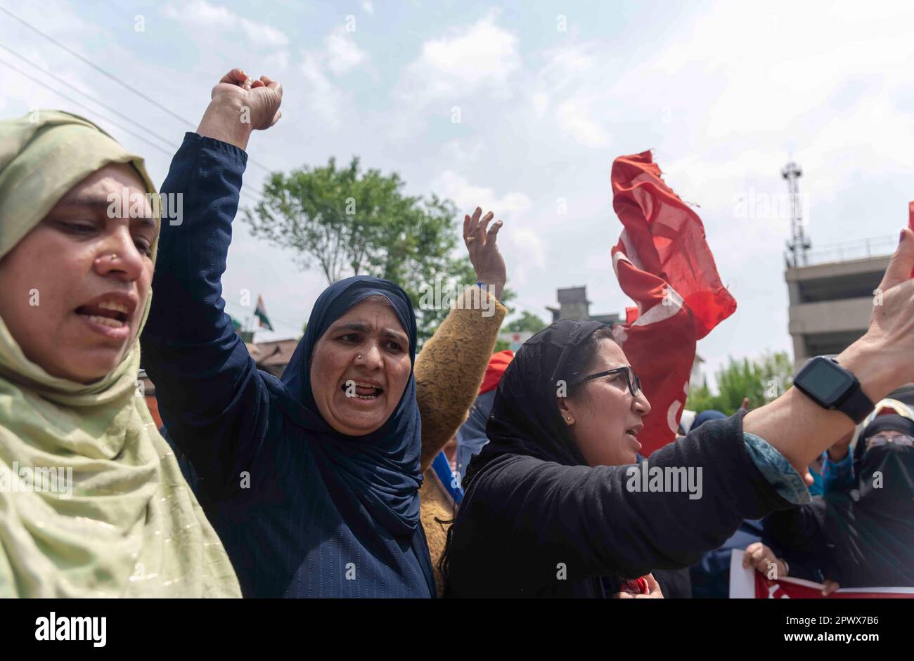 Contractual and Daily wage workers chant slogans during a protest ...