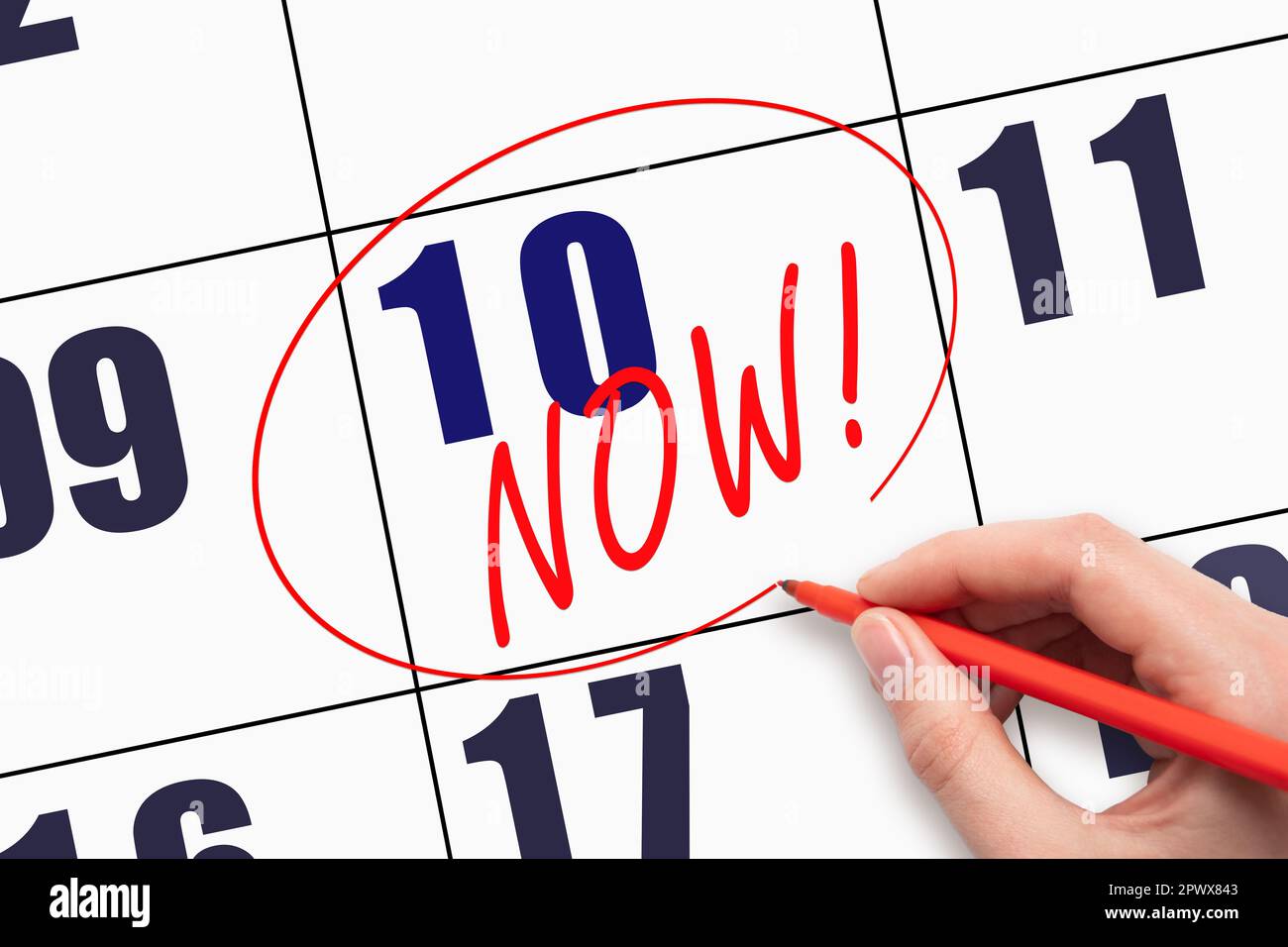 10th day of the month. Hand writing text NOW and circling the calendar ...