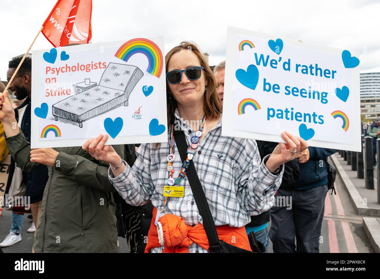 London, UK. 1 May 2023. NHS workers march from St Thomas’ Hospital to ...