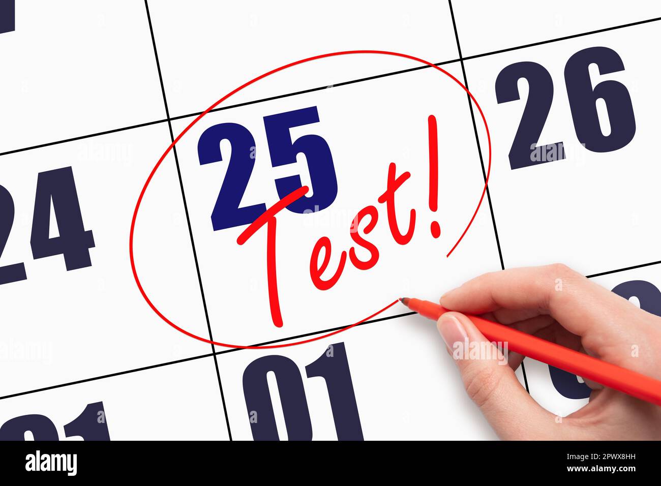 25th day of the month. Hand writing text TEST and circling the calendar ...