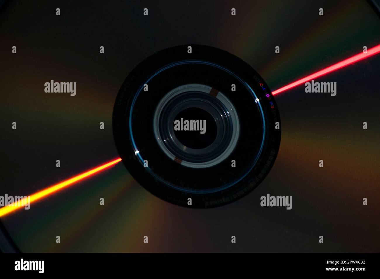 Close up CD disk surface. Abstract design of light, shape and palette ...