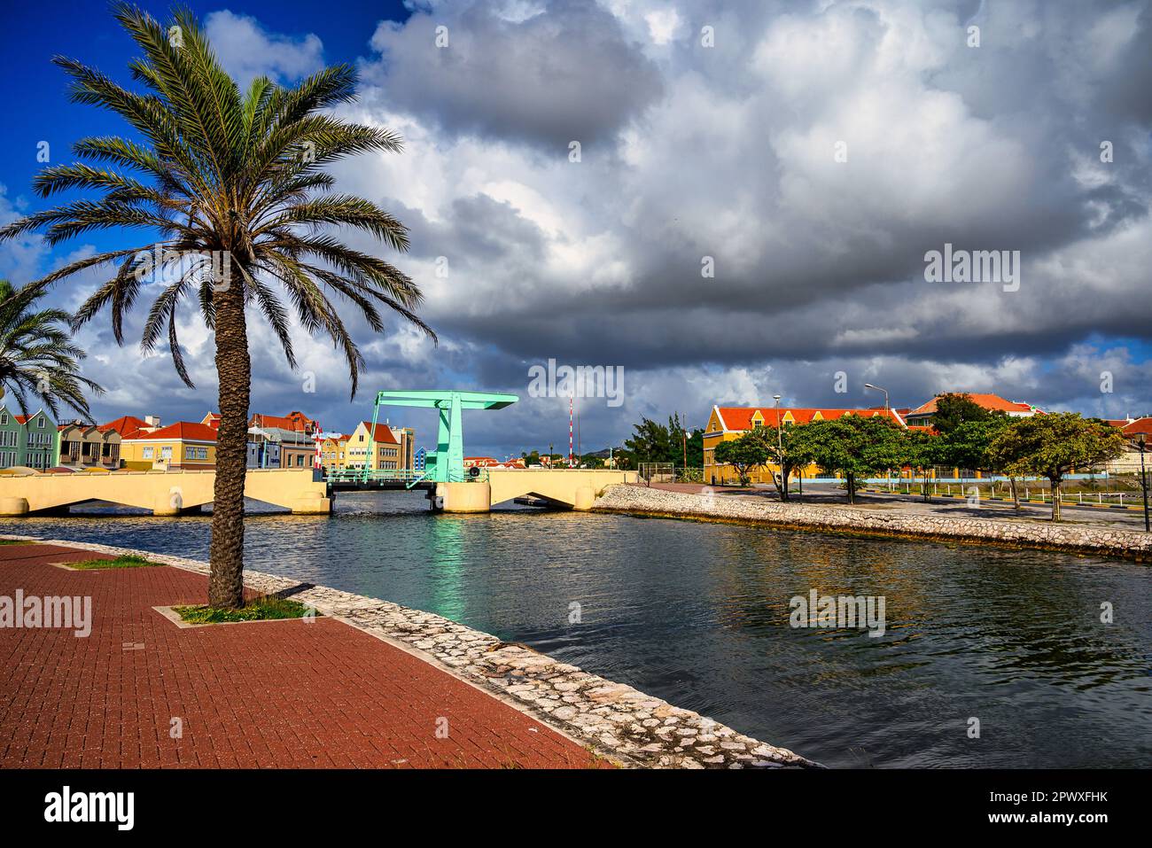 A view of a bridge in willemstad on curacao with blue sky and beautiful ...