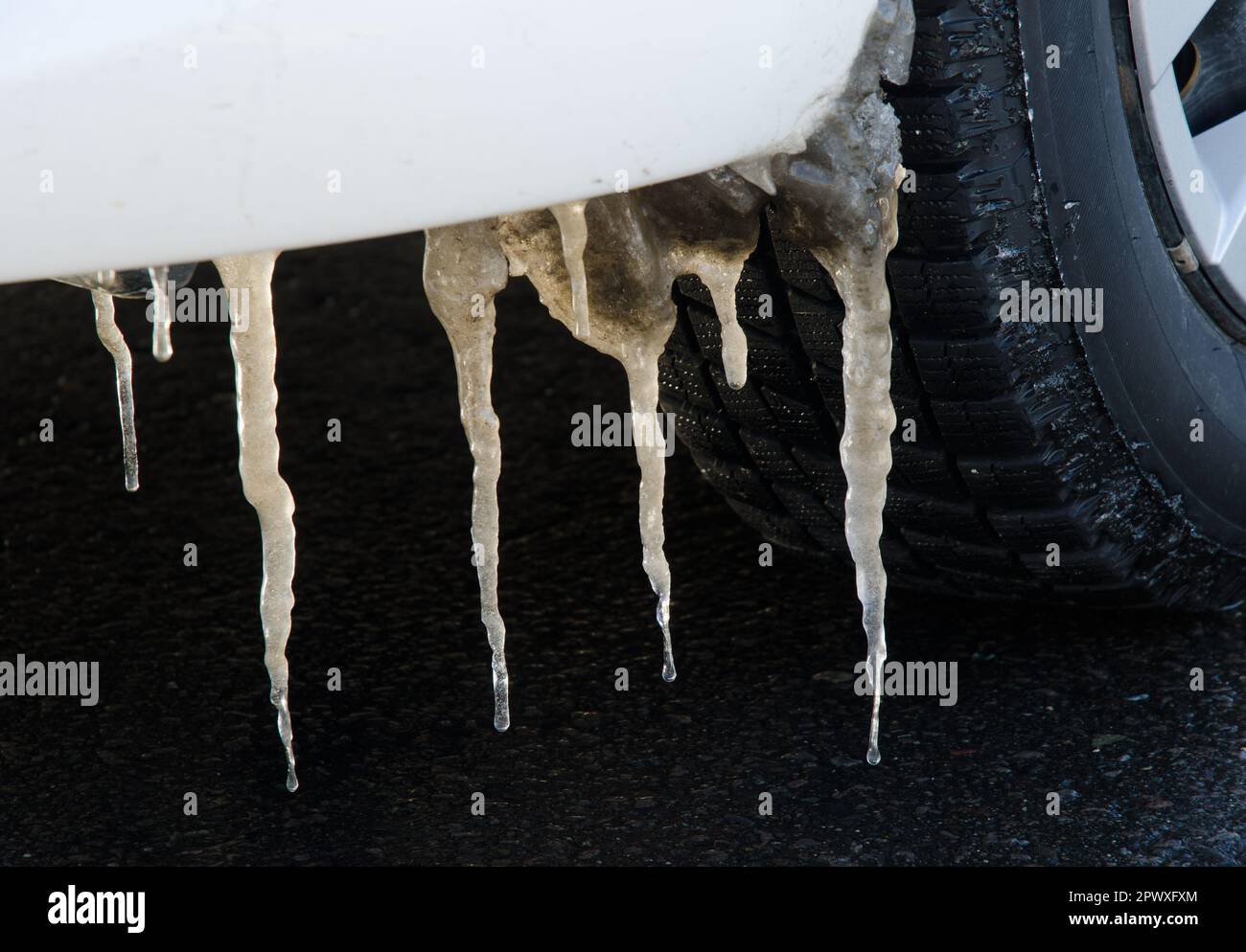 Ice icicles on the underside of a car. Utoro. Shiretoko Peninsula ...