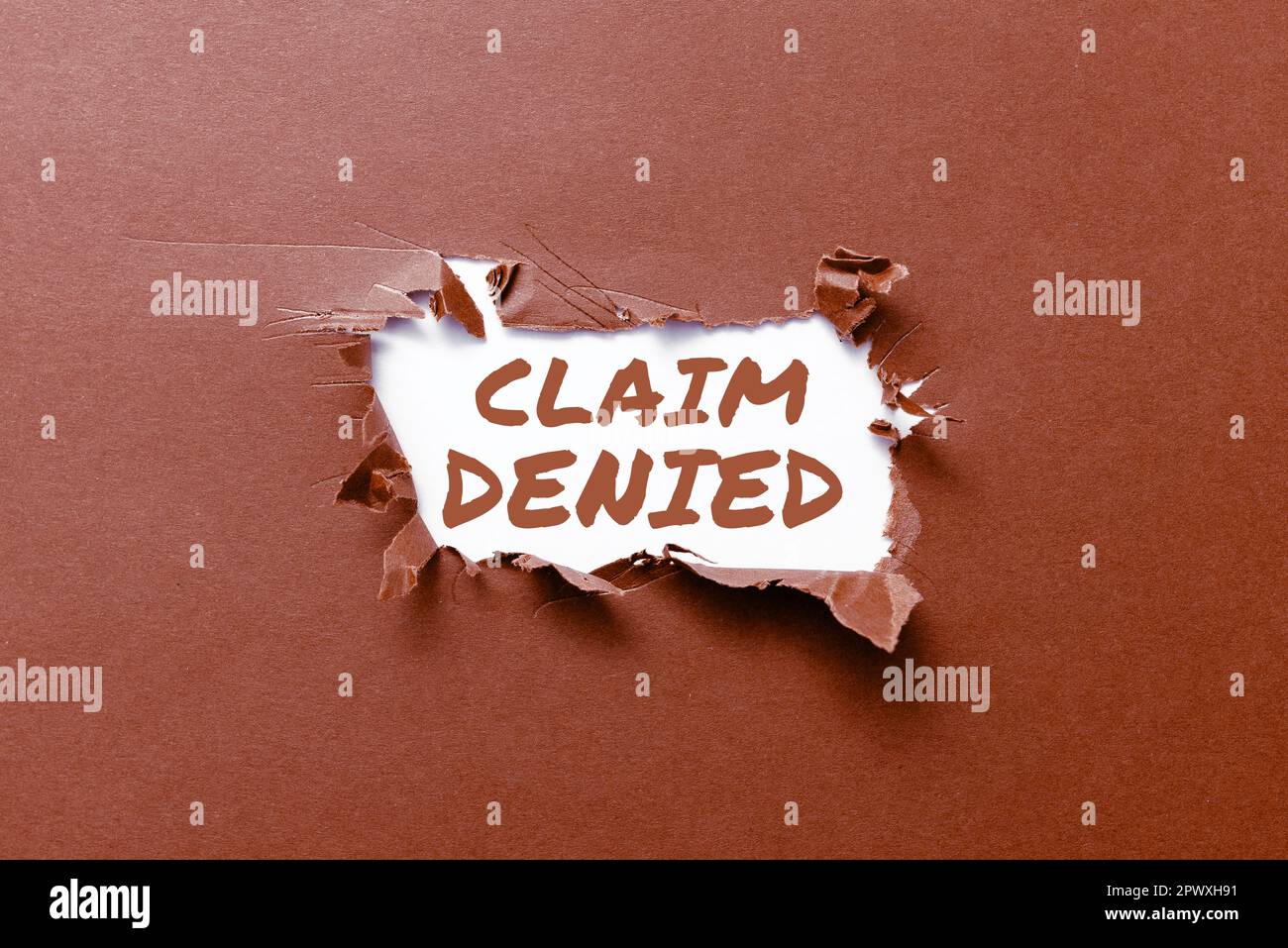 Hand writing sign Claim Denied, Business approach Requested ...