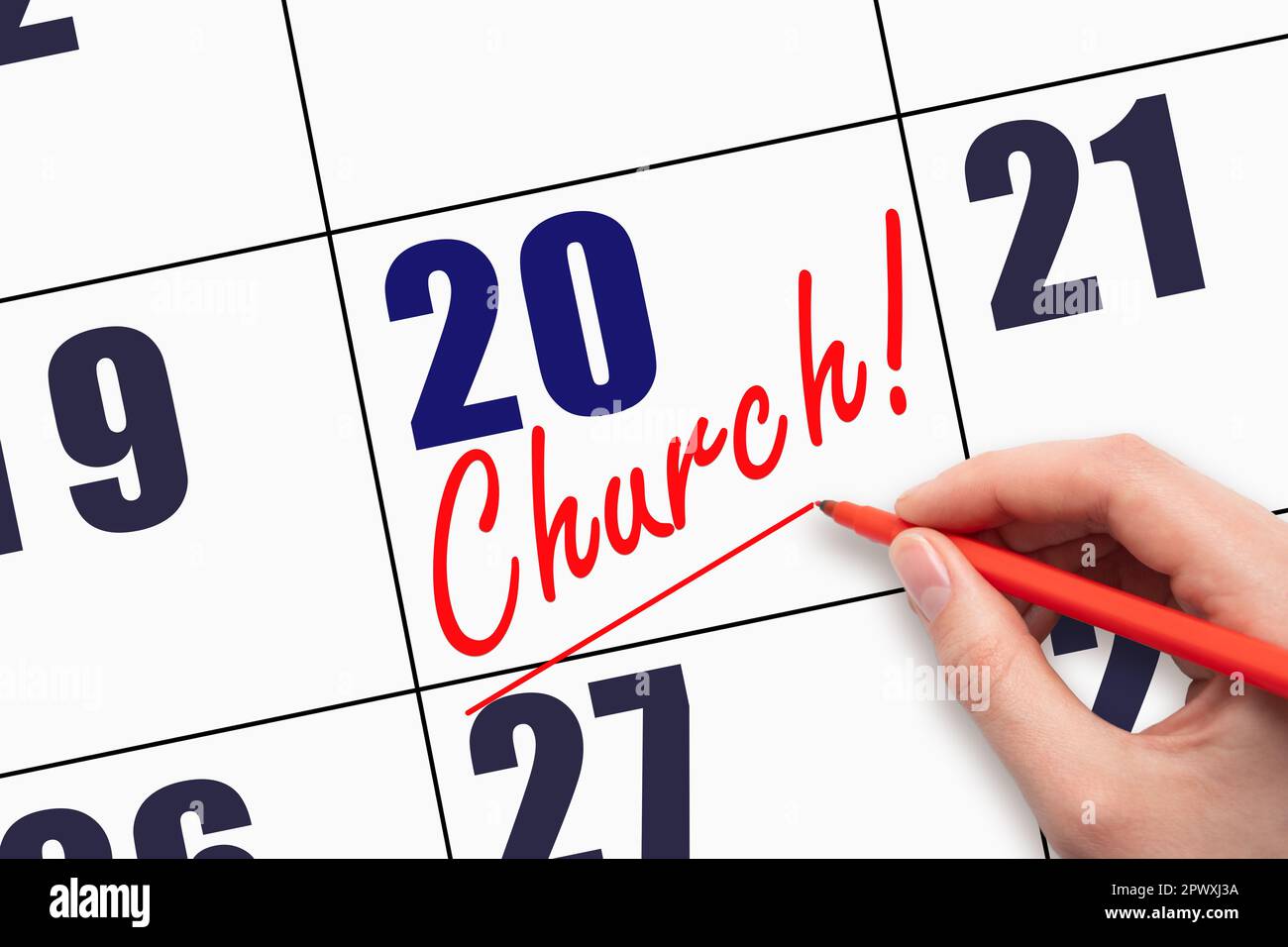 20th day of the month. Hand writing text CHURCH and drawing a line on ...