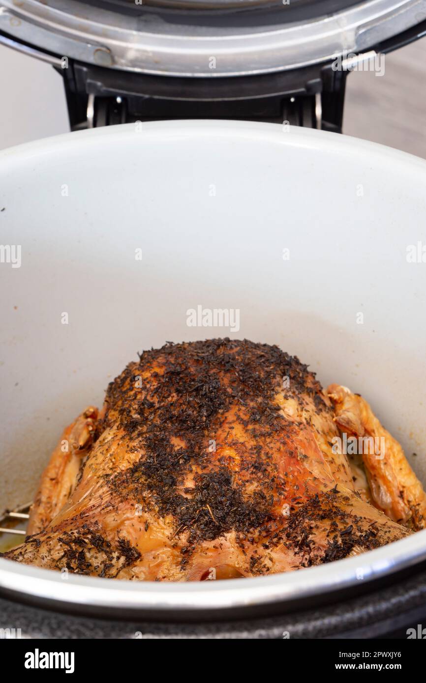 Chicken covered with mixed herbs cooked in an air fryer. Healthy low ...