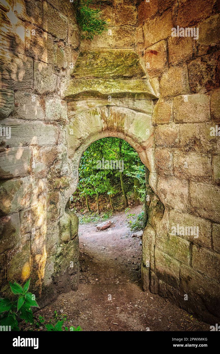 Heavily fortified castle ruins located on a dramatic promontory ...