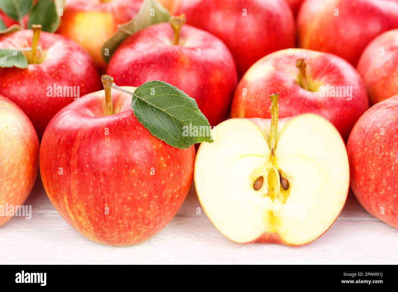 Apples sliced apple fruits fruit with leaves background leaf Stock ...
