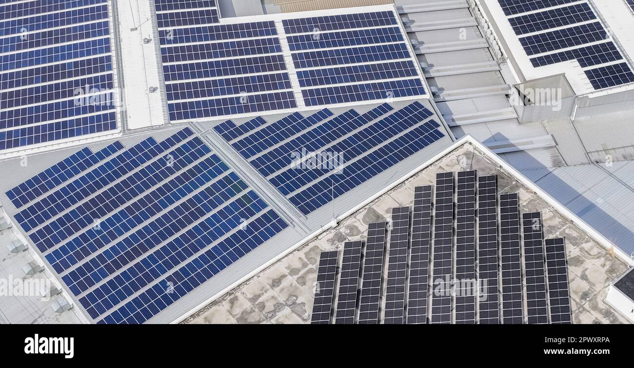 Aerial view of solar panels or photovoltaic module. Solar power for ...