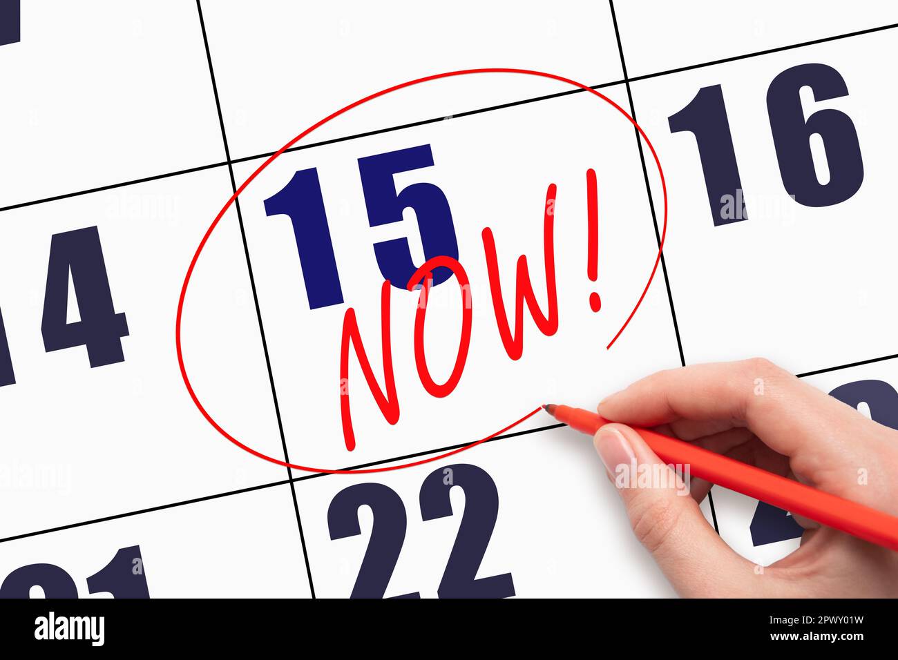15th day of the month. Hand writing text NOW and circling the calendar ...
