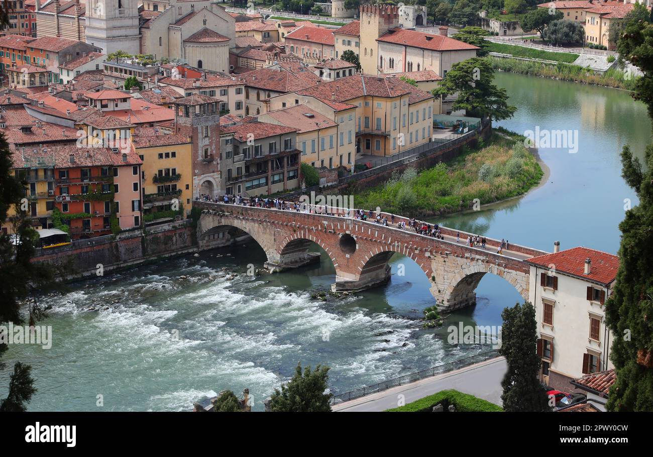 Verona City in Italy and old Stone Bridge called PONTE PIETRA over ...