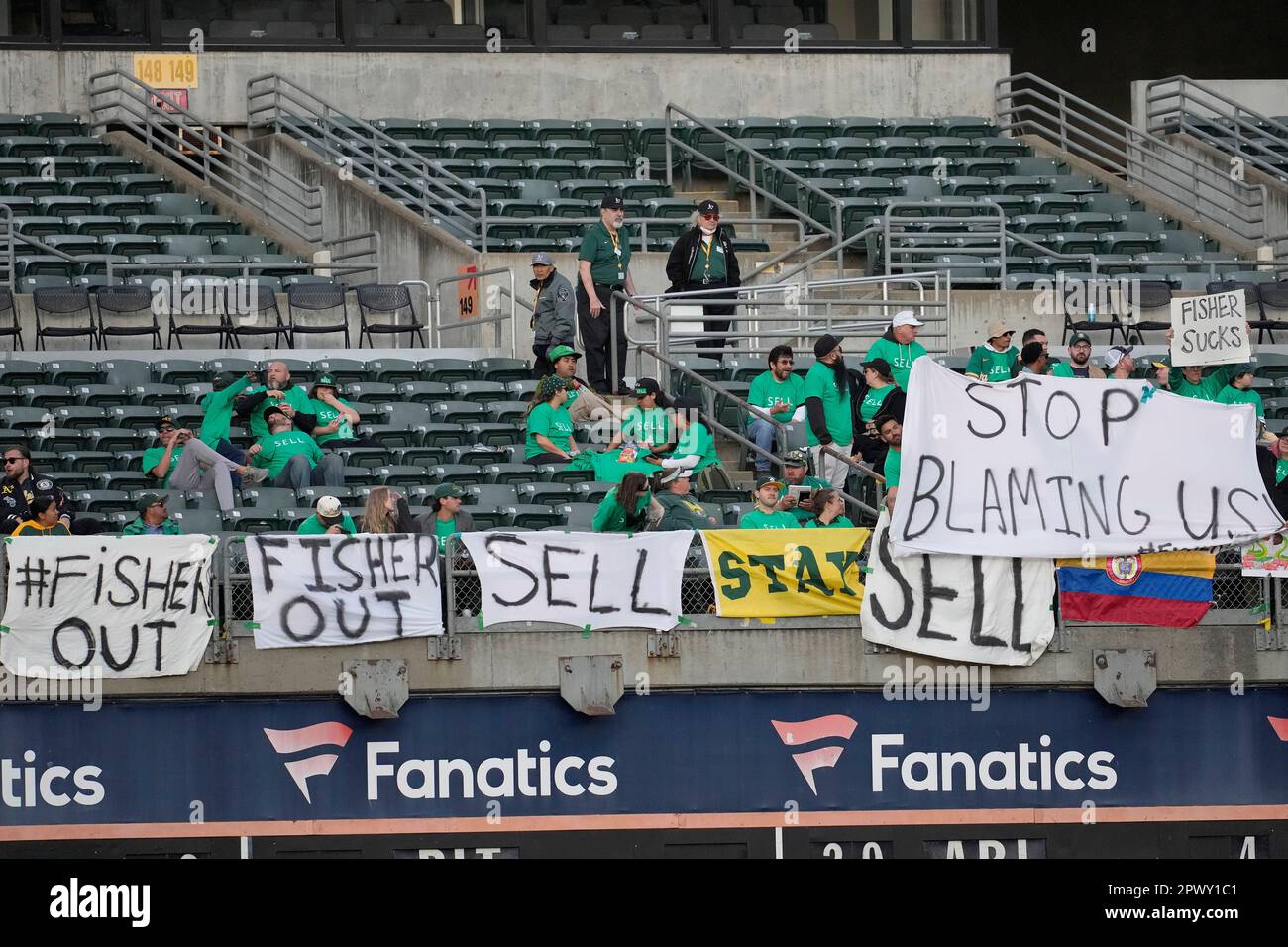 Oakland Athletics fans hang signs at RingCentral Coliseum to protest ...