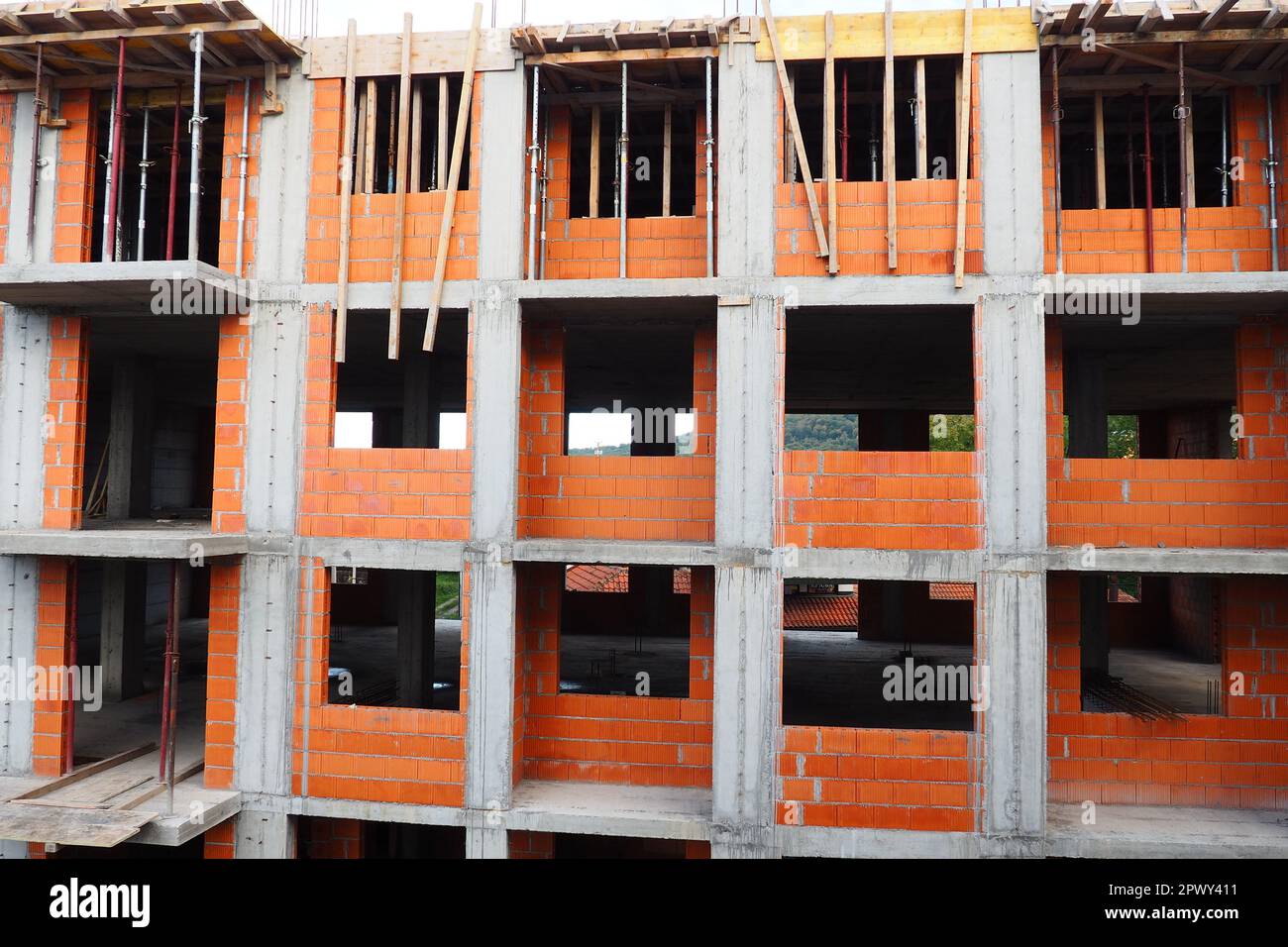 Red ceramic bricks at the construction site. Keramoblock. Hollow brick ...