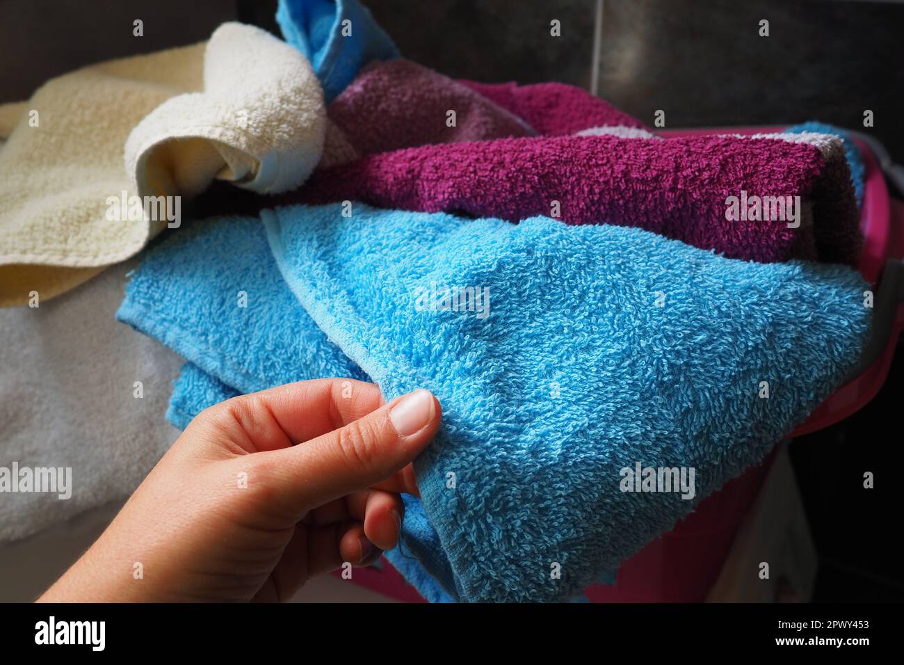 Woman sorting laundry washing machine hi-res stock photography and ...