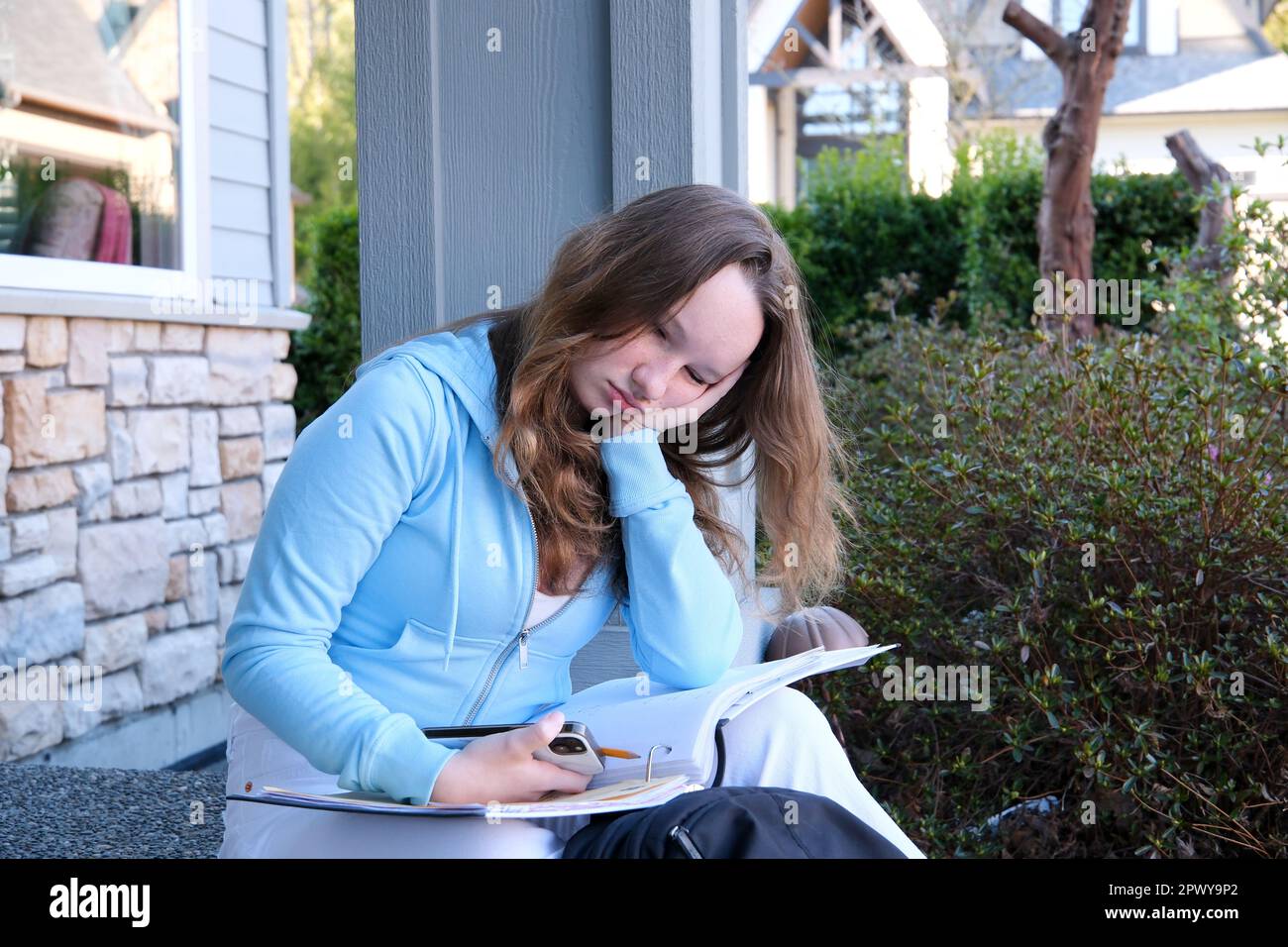 Tired asian lady feeling headache or stress, massaging temples, trying ...