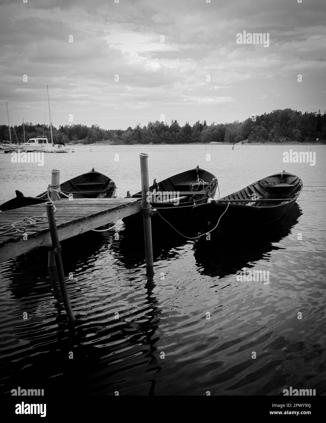 Small row boat in Black and White Stock Photos & Images - Alamy
