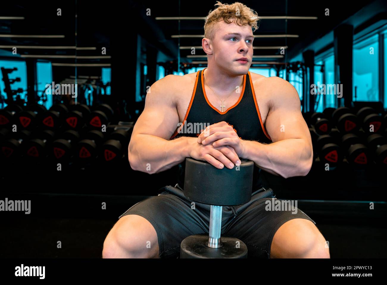 Bodybuilder resting between exercises hi-res stock photography and ...